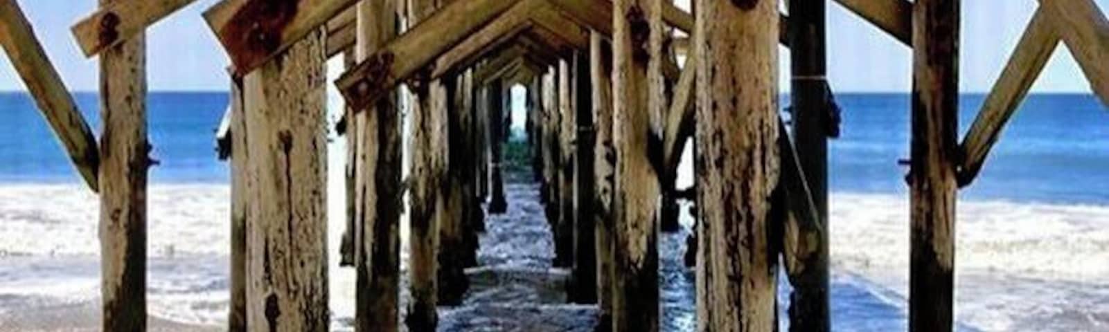 You can walk for miles and not see another person! This is an old pier that has largely been abandoned after a storm took out part of it. #Festival
