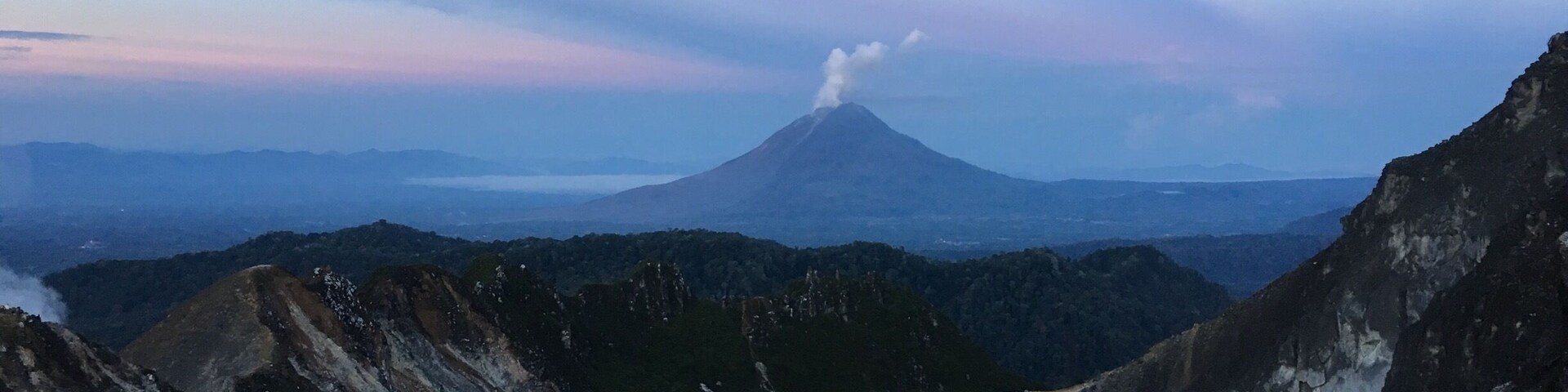 On a volcano #Mt Sibayak looking at another volcano#Mt Sinabung