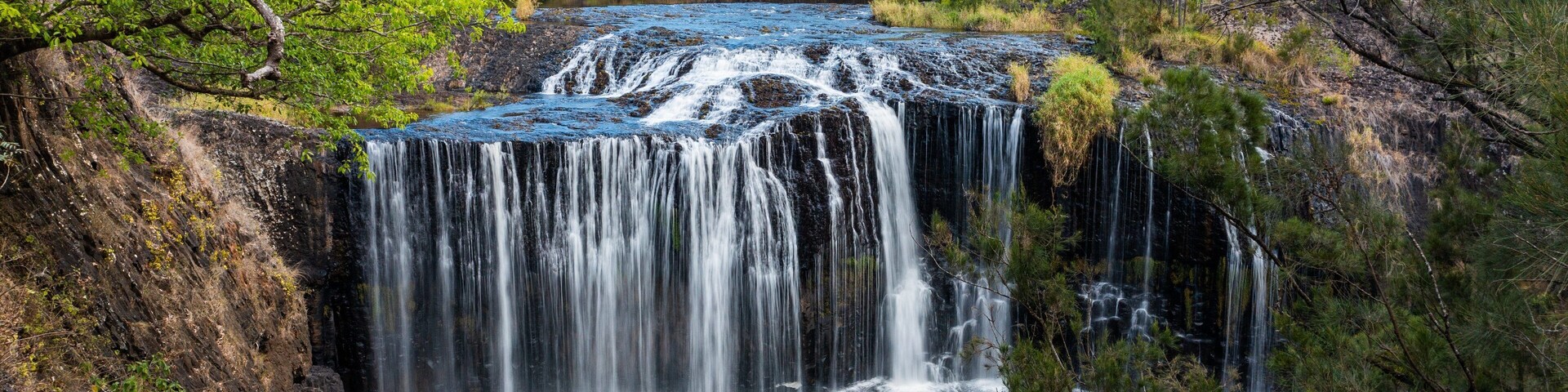 Millstream Falls National Park which includes a river or creek and a cascade