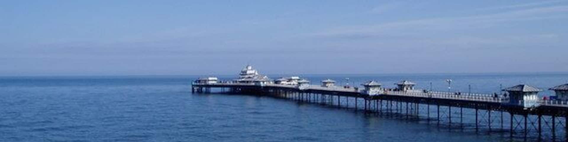Llandudno Pier Llandudno Pier took just over a year to construct, opening to the public in 1878., extending 1,234ft (376m) from the shore. Llandudno Pier is considered by many to be the finest surviving Victorian pier in Britain and is now a Grade II listed building. Photograph taken on a particularly fine Sunday afternoon in February.