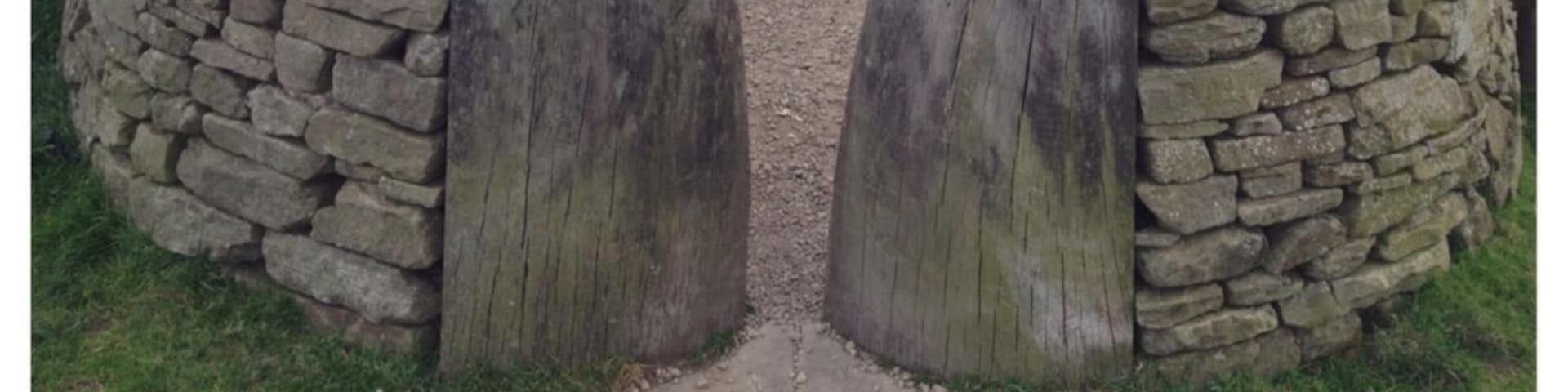 Here's an interesting thing. Looks like a circular sheep pen made from dry stone walls split by two chunky and smooth wooden kissing styles. It is a viewing point with about a dozen holes through the top stones aligned to frame landmarks on the 360 degree horizon, with lovely industrial looking metal 'eyepieces' bearing the names of what you are looking it. Tegg's Nose hill is the site of a disused quarry that operated from the 16th century until 1955.