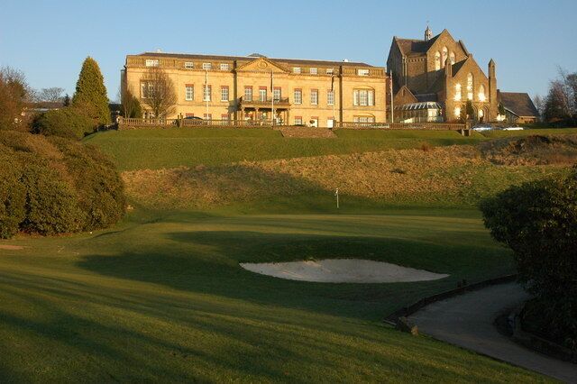 Shrigley Hall Hotel Shrigley Hall Hotel is a former country house which is now owned by the Spanish hotel chain Barcelo, the former church, seen on the right, is now a swimming pool and part of the leisure complex. The hotel grounds amount to a 262 acres golf course. This building has been a hotel since 1989, my old OS map from the 1970s indicates that this building used to be a college.