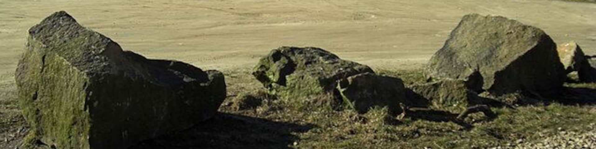 Brushes Clough car park The large rocks mark the limit of the car parking area.