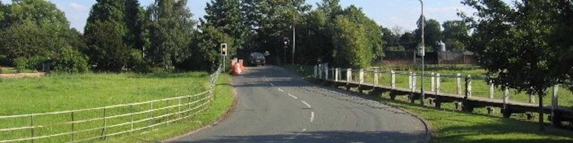 Wolston Bridge. The Brandon - Wolston Road crosses the River Avon at this narrow single lane bridge, largely obscured by trees. A raised footway is provided to maintain a path in times of flood.