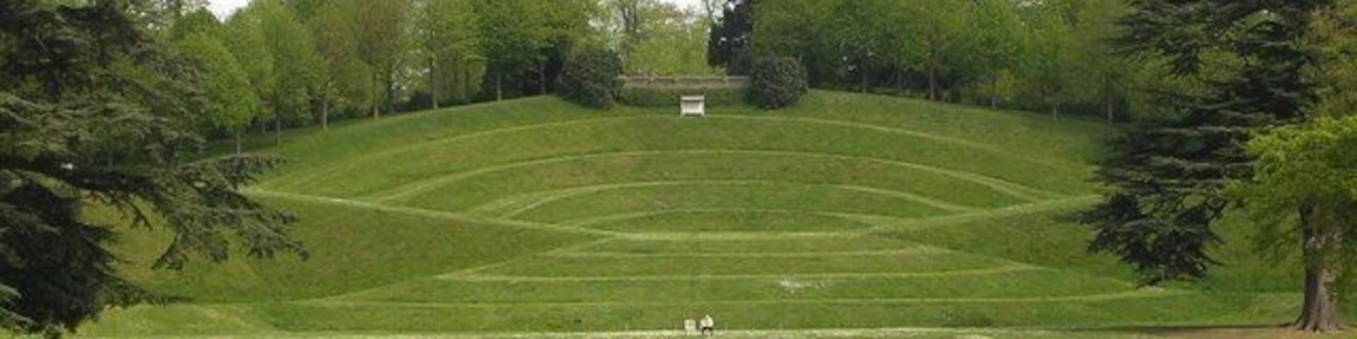 Claremont Landscaped Garden. The turf amphitheatre is the centrepiece of this, one of the first and finest gardens of the English landscape style. The gardens were begun by Sir Jon Vanbrugh and Charles Bridgeman before 1720, before being extended by William Kent. Capability Brown also made improvements. Today the gardens are a National Trust property.