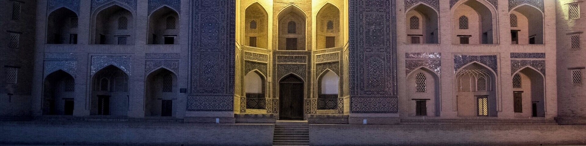Slipping through Bukhara's courtyards at night.