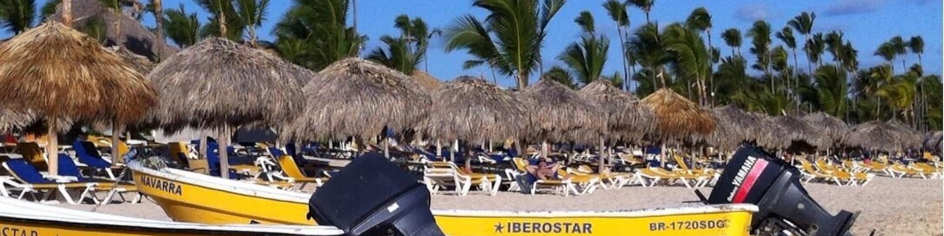 The dive boats on the beach at the hotel. A clean beach with many places to relax. Good diving is just off the shore.