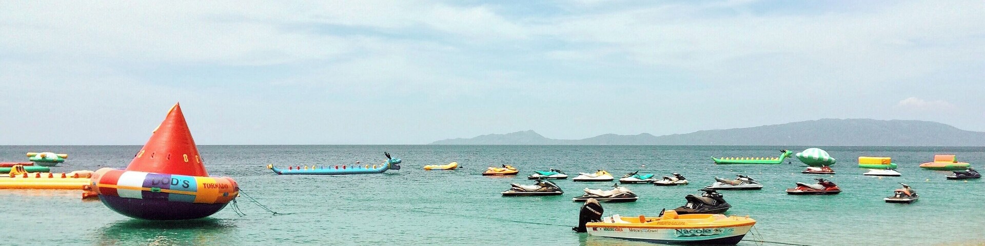 Jet skis, banana boats, and inflatables — these beach toys guarantee that you won't run out of water activities to do on Puerto Galera. #BeachTips