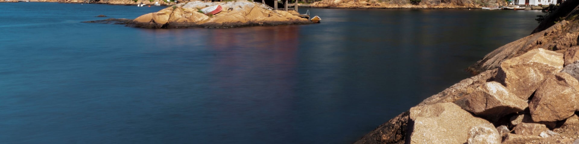 The Little Red House on a small island.