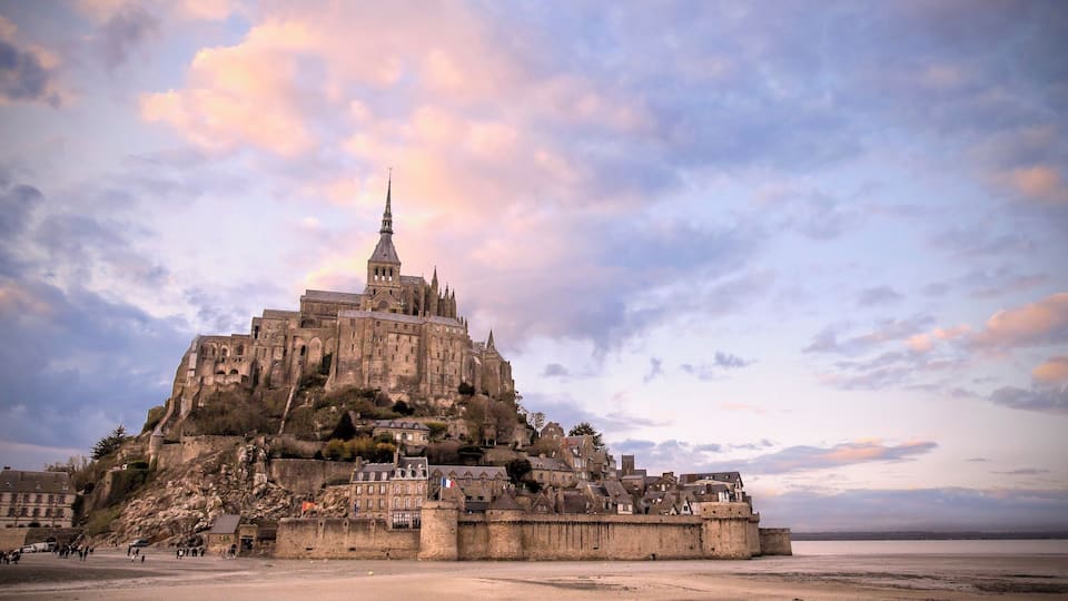 Mont St. Michel... From 966 onwards, the dukes of Normandy, followed by French kings, supported the development of this major Benedictine abbey on the Mont-Saint-Michel
This was also the inspiration for Minas Tirith in the Lord of the Rings, Return of the King...