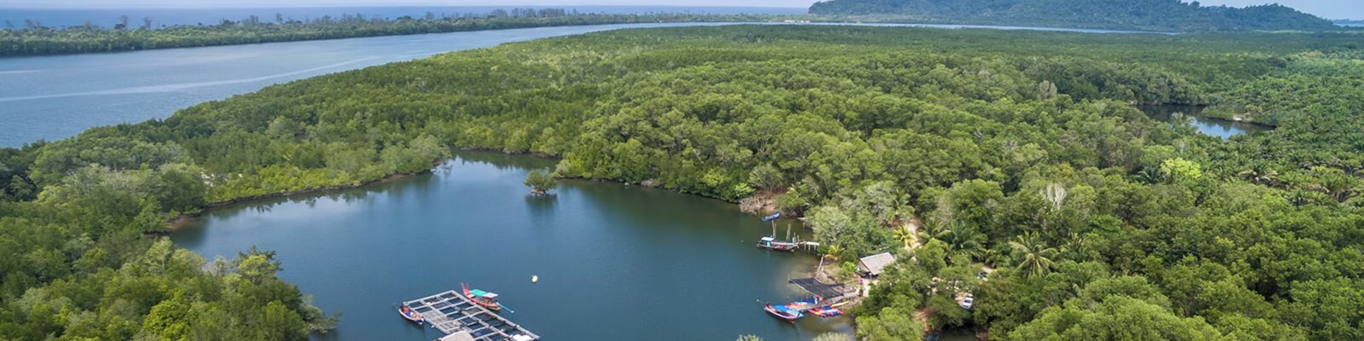 Baan Tha Din Daeng is a small village located in the province of Phang Nga in South Thailand. The local community runs a small tourist attraction at this lake from which you can enjoy long-tail boat tours in the mangrove forest and to the stunning Khao Na Yak in khao lampi-hat thai mueang national park, a short distance away. #LifeAtExpediaGroup