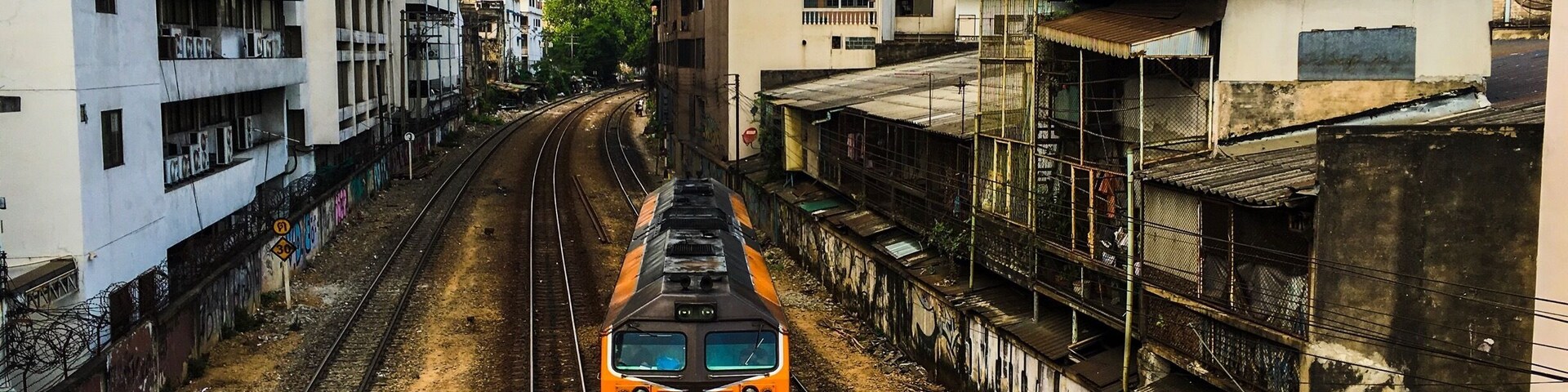 Street art and train. Over a bridge in Bangkok city