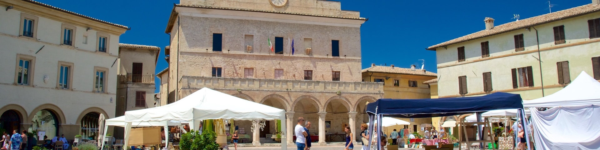 Montefalco which includes markets and a square or plaza