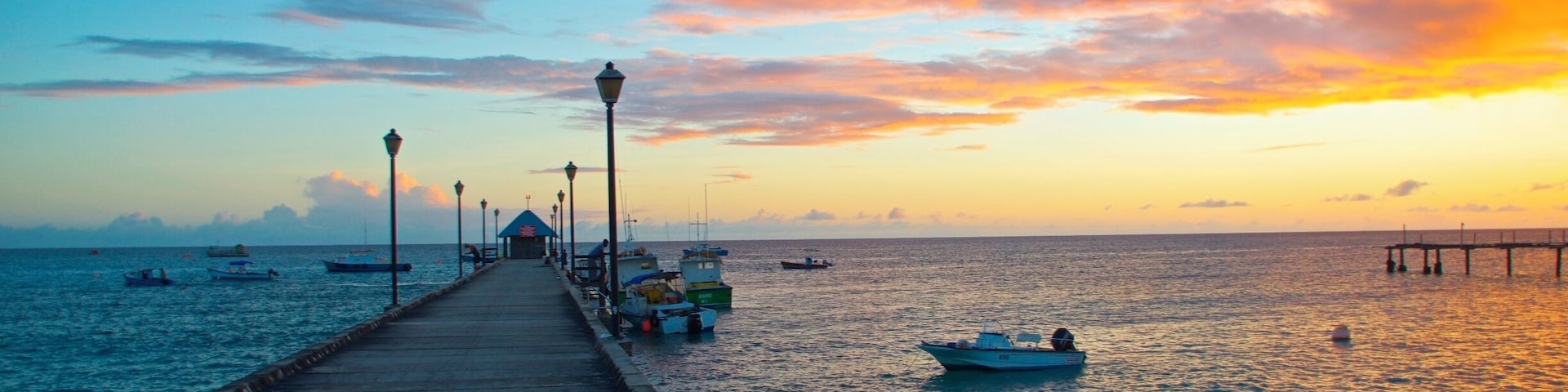 Great fish market with lots of huts selling grilled fish Friday night is hopping with entertainment. Any evening at sunset walk along the pier and see the turtles looking for fish scraps. #BeachBound