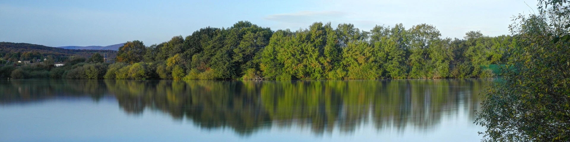 NOTE: This image is a panorama consisting of multiple frames that were merged or stitched in software. As a result, this image necessarily underwent some form of digital manipulation. These manipulations may include blending, blurring, cloning, and color and perspective adjustments. As a result of these adjustments, the image content may be slightly different than reality at the points where multiple images were combined. This manipulation is often required due to lens, perspective, and parallax distortions.