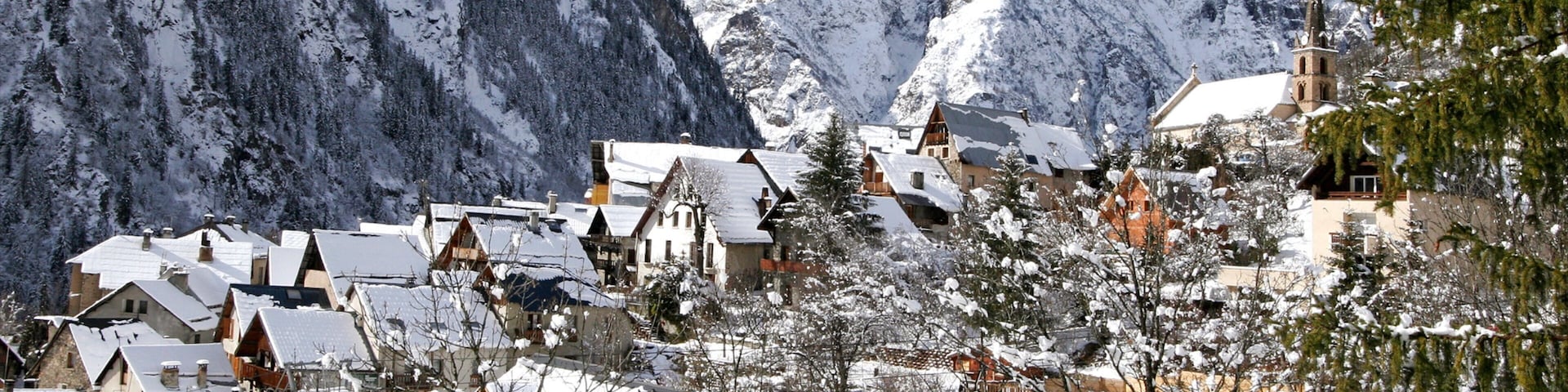 Alpes du Nord featuring a small town or village and snow