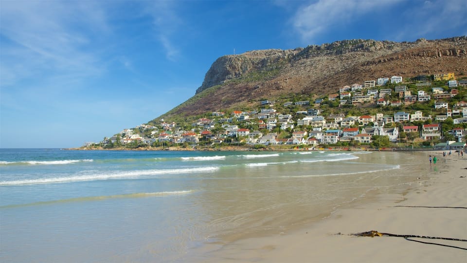 Fish Hoek which includes general coastal views, a coastal town and a sandy beach