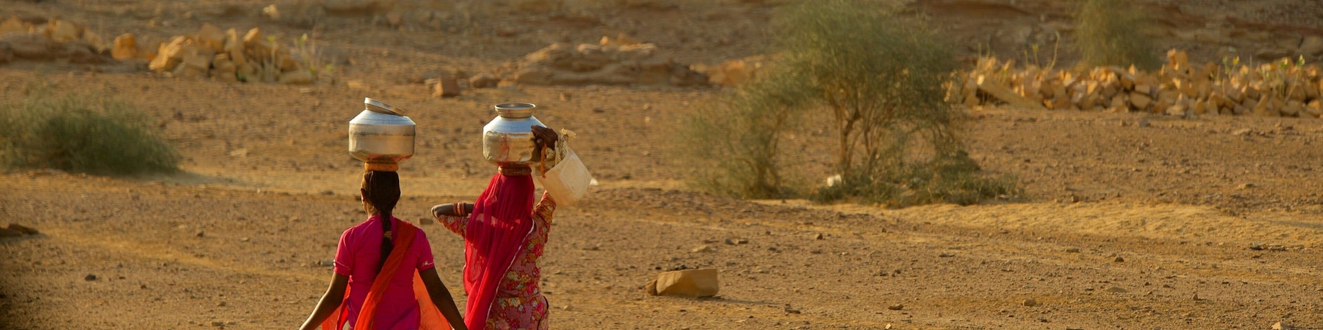 Desert National Park featuring desert views as well as a small group of people