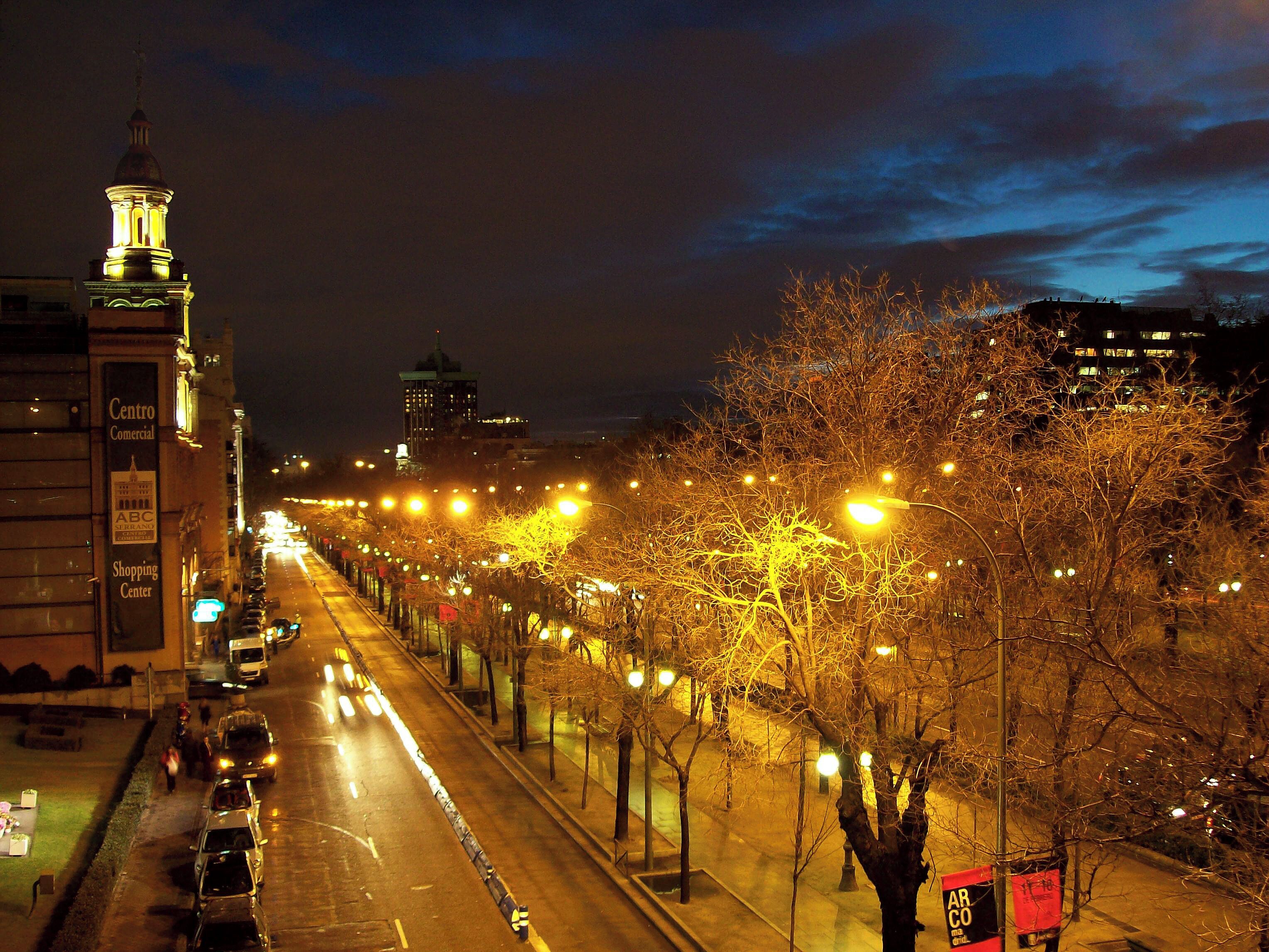Night view of Paseo de la Castellana (avenue) in Madrid (Spain) from Puente de Enrique de la Mata Gorostizaga (bridge, Salamanca district). In the background, Plaza de Colón ("Columbus Square").