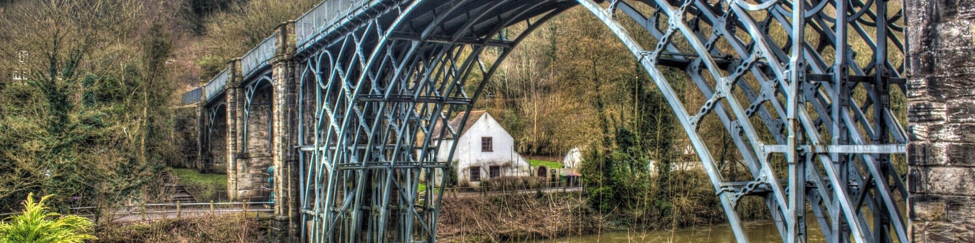 The Iron Bridge is the very first bridge fabricated from cast iron anywhere in the world, and is an iconic symbol of the dawn of the Industrial Age.