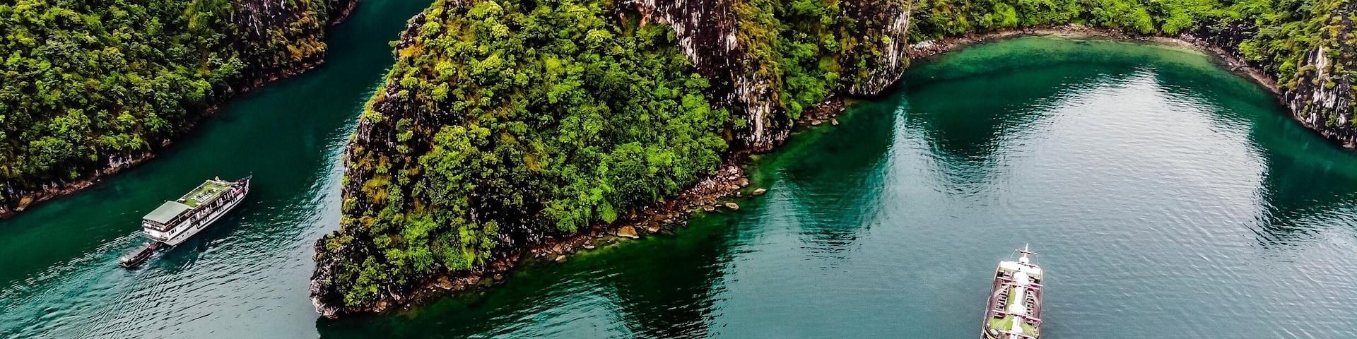 With 1,600 limestone islands and islets topped with lush green tropical plants and towering from the emerald waters of the Gulf of Tonkin, Ha Long Bay - the bay of the descending dragon - is definitely a magical destination.
However, because of the millions of travelers visiting the area every year,the best way to truly experience Ha Long Bay is to book a cruise on one of the most exclusive junk boat like those operated by Indochina Junk that will take you to the routes less traveled. My only regret in fact was that I had only booked a one night cruise instead of a longer one : I definitely need to come back!