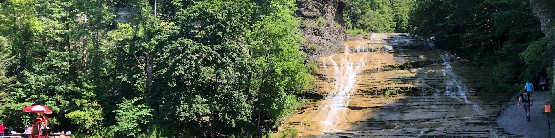 The grassy area beside the swimming area isn’t particularly large. It’s both in the sun and under shaded trees with picnic tables scattered. Many people lounge on towels or bring fold out chairs, content with location and not swimming while others jump in or simply dip their feet. The hiking trail along the fall takes you high and isn’t for those who dislike the stairs, but staying below isn’t half bad either. #hiking #waterfalls #upstateny #stateparks #swimmingholes