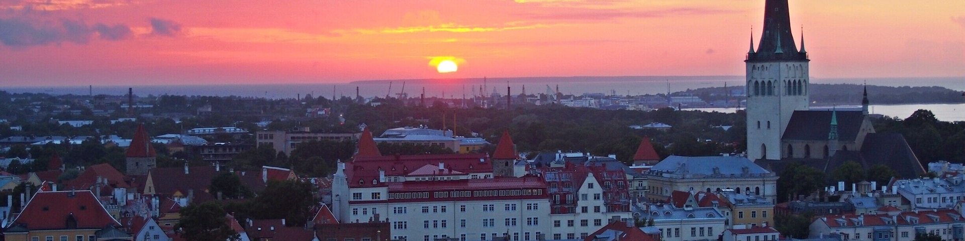 Spectacular sunset over the rooftops of Tallinn, the capital of Estonia, that is oozing with medieval feel. 
The old city used to be an important hanseatic trading place during 13th-16th centuries. Today, it is a UNESCO world heritage site and a popular place among history lovers. 
#AboveItAll