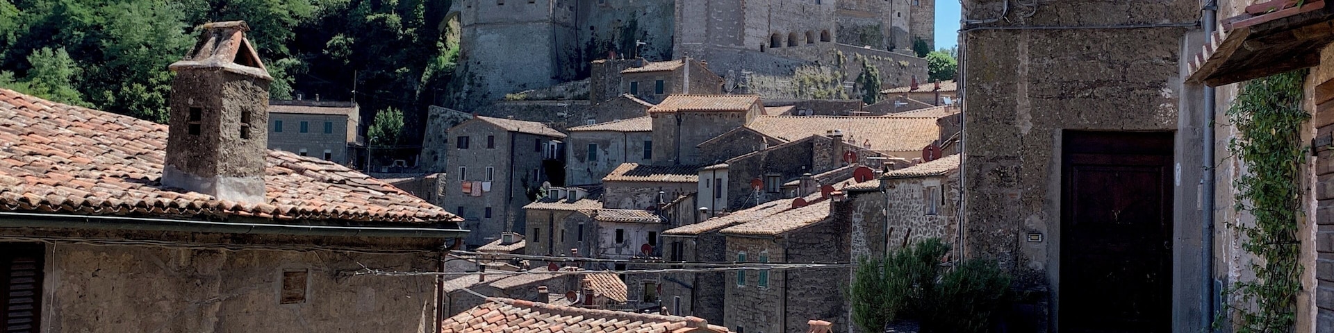 Sorano small village in Maremma region in Tuscany. Built on top of a hill made of tuff. View of the ancient fortress.