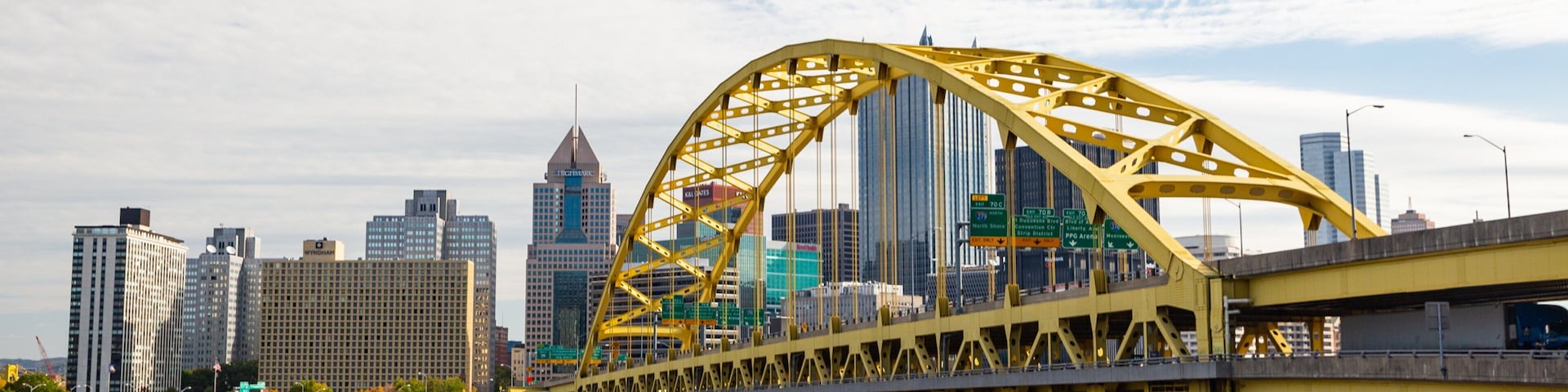 Downtown Pittsburgh showing a bridge and a river or creek