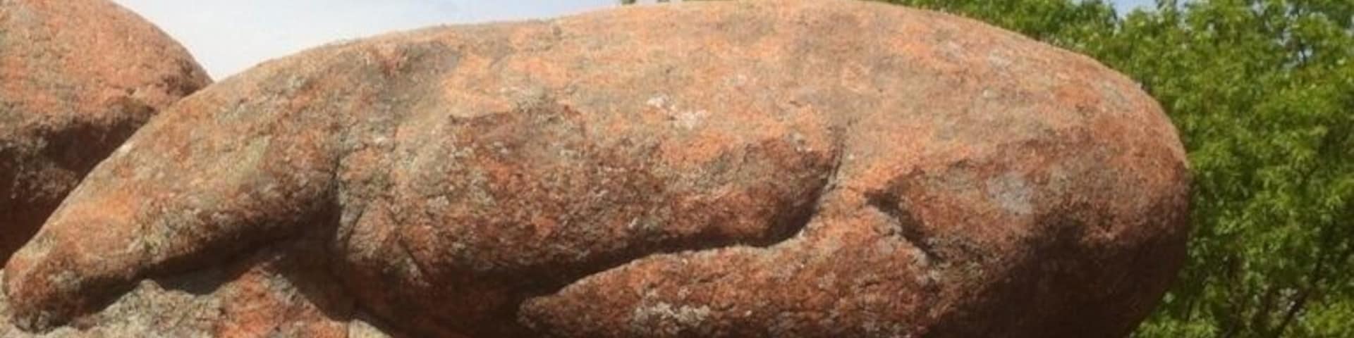 A huge granite boulder located in Elephant Rocks State Park