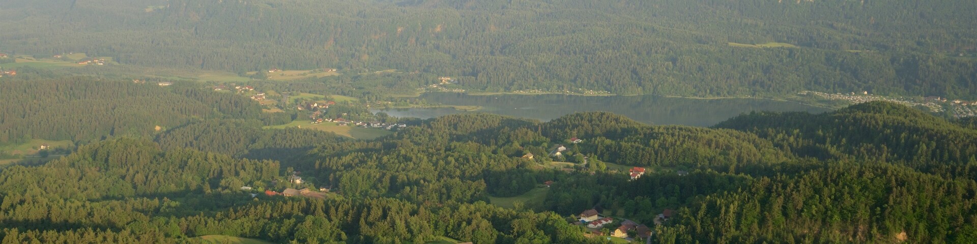 Keutschach am See mostrando cenas tranquilas, paisagem e um pôr do sol