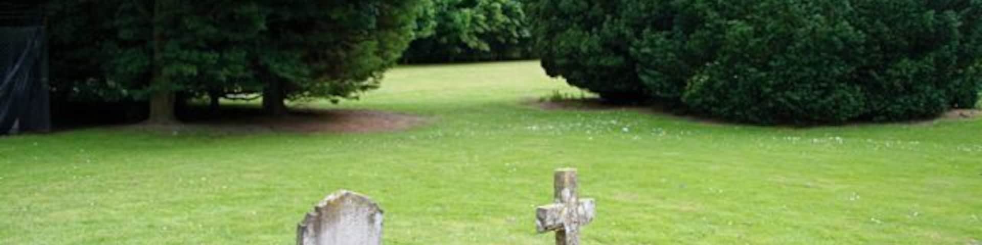 Solitary grave stone in a park The inscription says, "In memory of the patients of Fulbourn Hospital buried in this cemetery 1862-1953. May They Rest In Peace. This stone marks the site of the hospital cemetery chapel dedicated and consecrated by the Bishop of Ely on June 24th 1862."