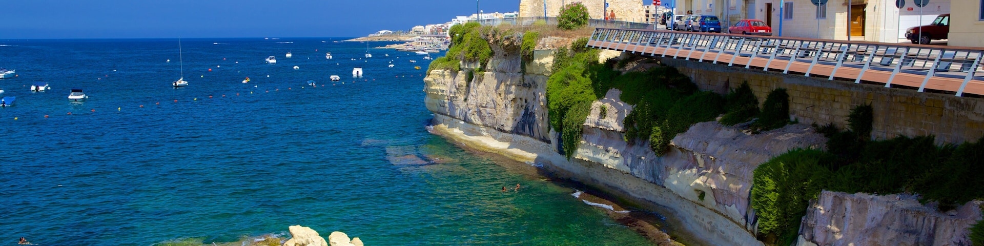 St. Paul\'s Bay caracterizando litoral rochoso e uma cidade litorânea