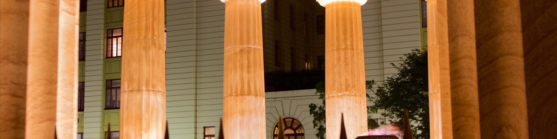 ANZAC Square War Memorial showing signage and a city