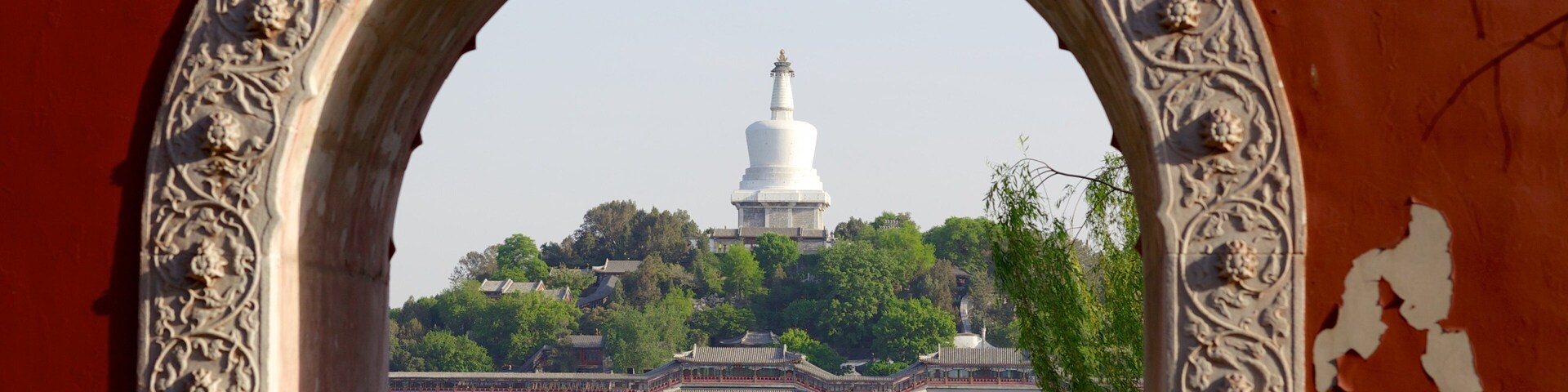 Beihai Park showing views as well as an individual femail