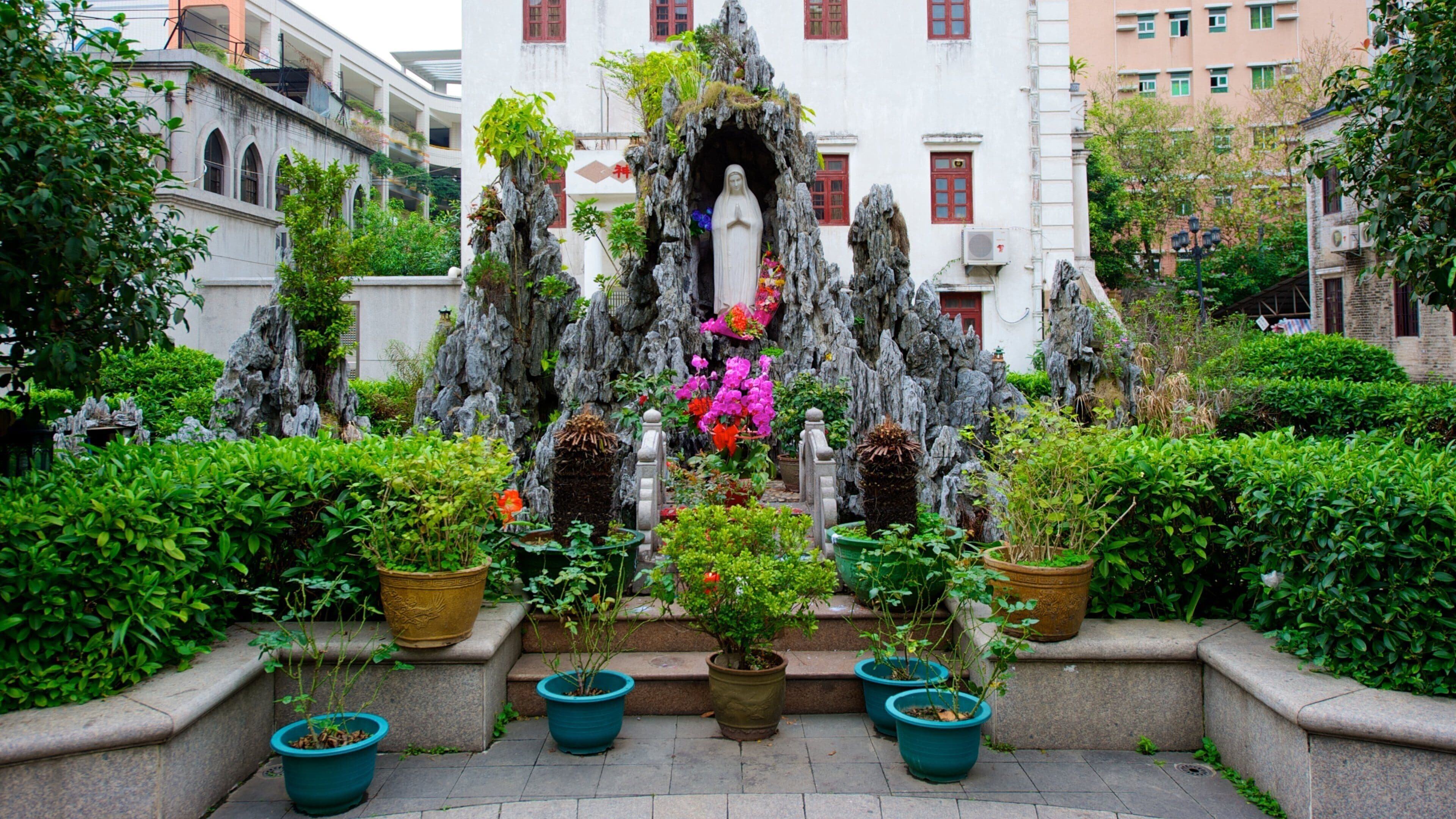 Sacred Heart Cathedral featuring flowers, religious aspects and a church or cathedral