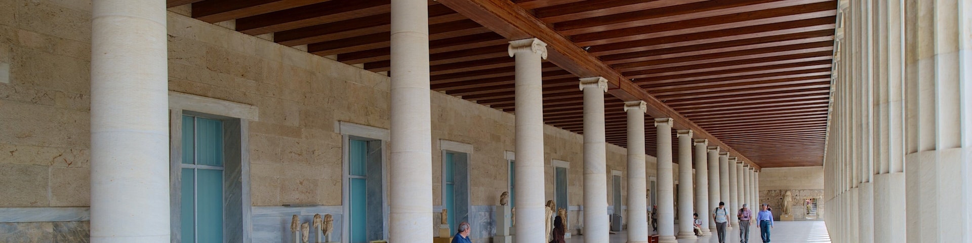 Stoa of Attalos featuring heritage architecture and a statue or sculpture