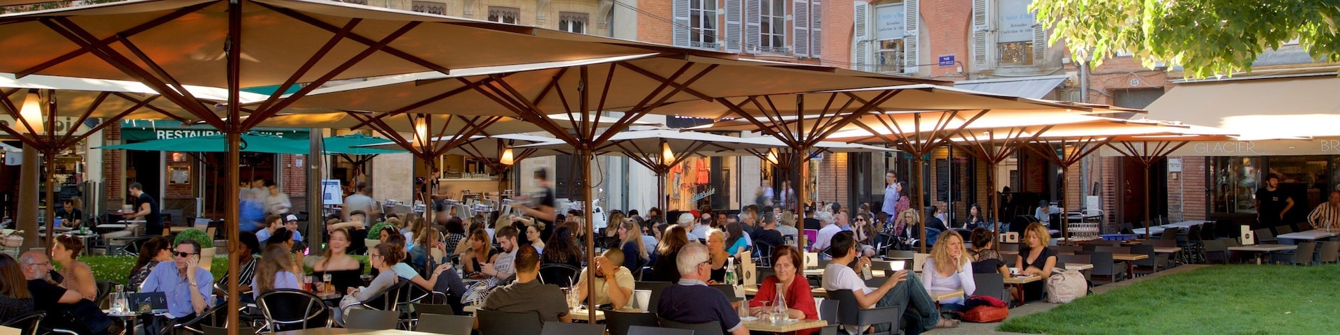 Saint George Place which includes outdoor eating as well as a large group of people