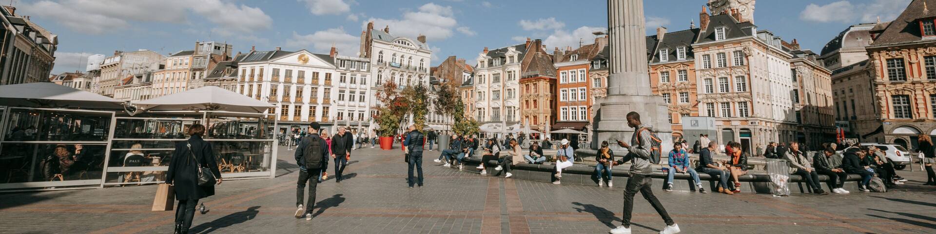 Lille Grand Square which includes a square or plaza, street scenes and a statue or sculpture