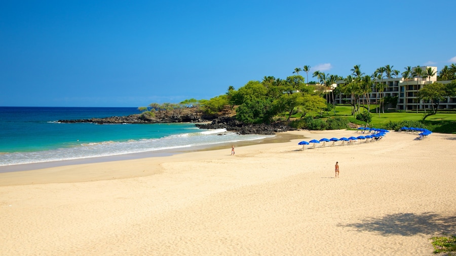 Hapuna Beach State Park which includes a coastal town, a beach and a luxury hotel or resort