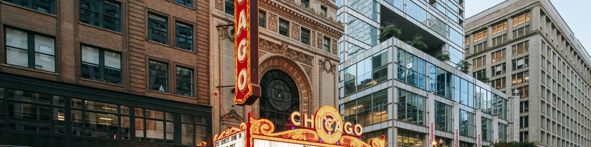Chicago Theatre featuring a city, signage and street scenes