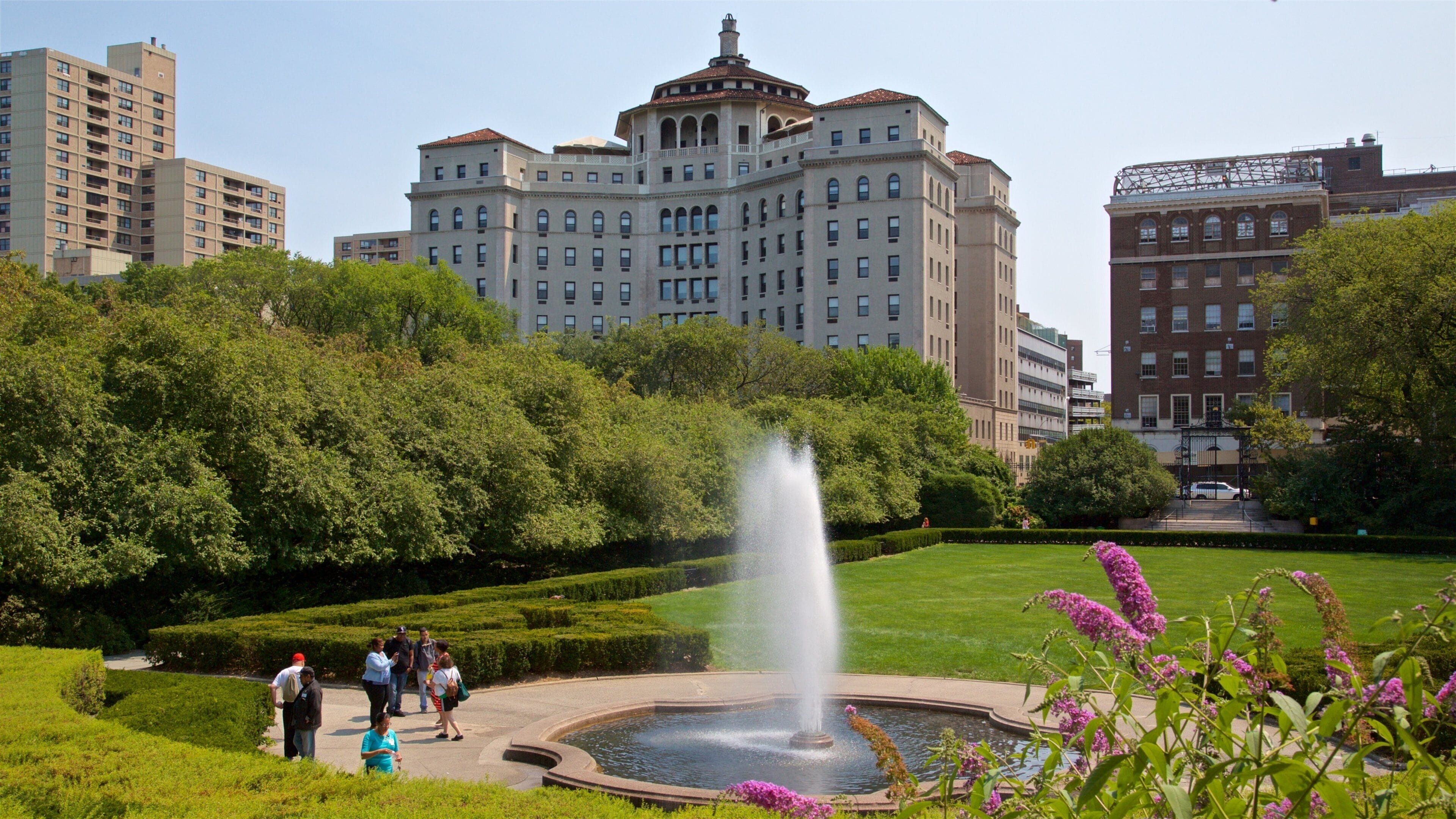 Conservatory Garden featuring a city, a fountain and a garden