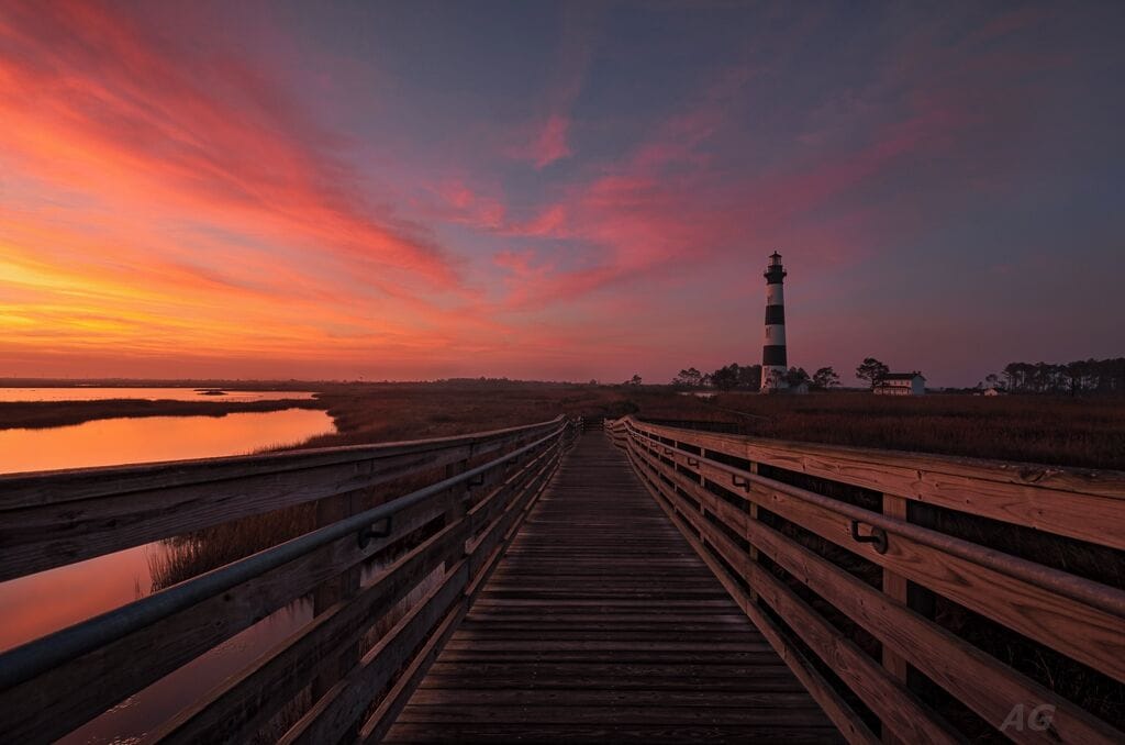 "Inferno"

Just another insanely early morning shot taken at Bodie Island Lighthouse on the North Carolina Outerbanks. The colors were breathtaking - the clouds looked like flames shooting across the sky. This is what inspired the title of the image.

I was at this location recently and for anyone who's looking to visit this location, the timing is ideal for both astrophotography on clear nights and the prospect of great light and clouds because of the springtime storms. Also it's the last chance to enjoy the OBX before the official start of tourist season.

Th final image is a blend of 3 exposures to capture this pretty dynamic scene while preserving details in the sky and enhancing some shadow detail without introducing too much noise.

Thank you for stopping by.

#colorful #NC #USA #Lighthouse #Bodie #Dawn #Sunrise #OBX #Outerbanks #goldenhour #roadtrip #weekend #blue #bestof5 
#history