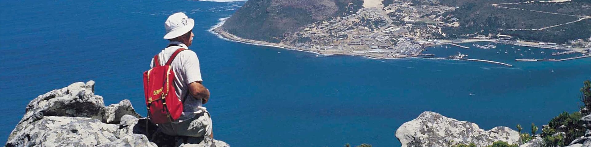 Hout Bay Beach which includes landscape views, hiking or walking and general coastal views