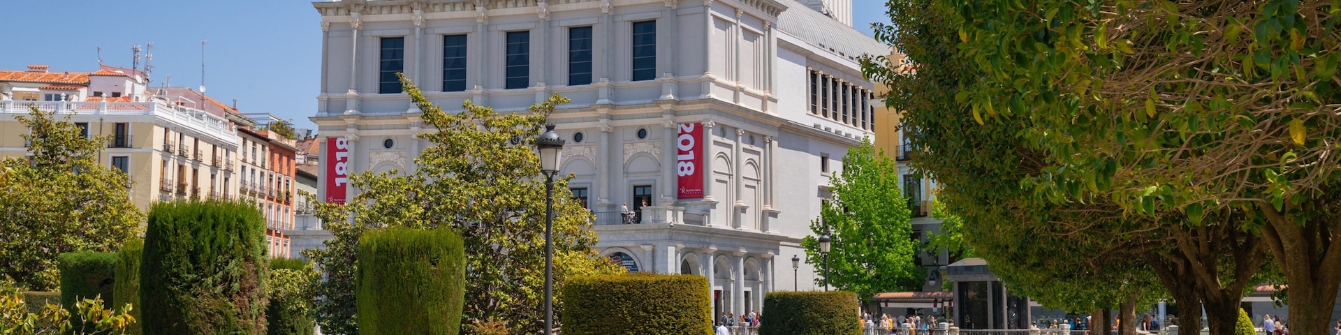 Plaza de Oriente which includes a park and heritage architecture