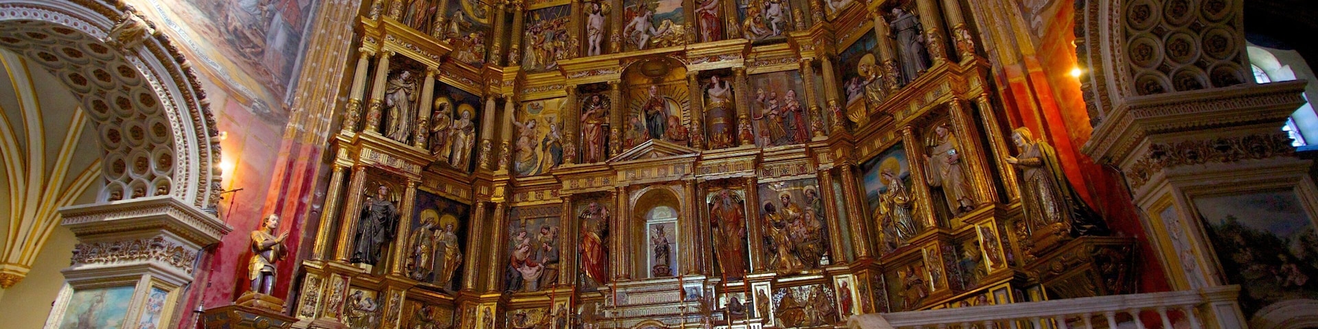 Mosteiro de São Jerônimo que inclui vistas internas, arte e elementos religiosos