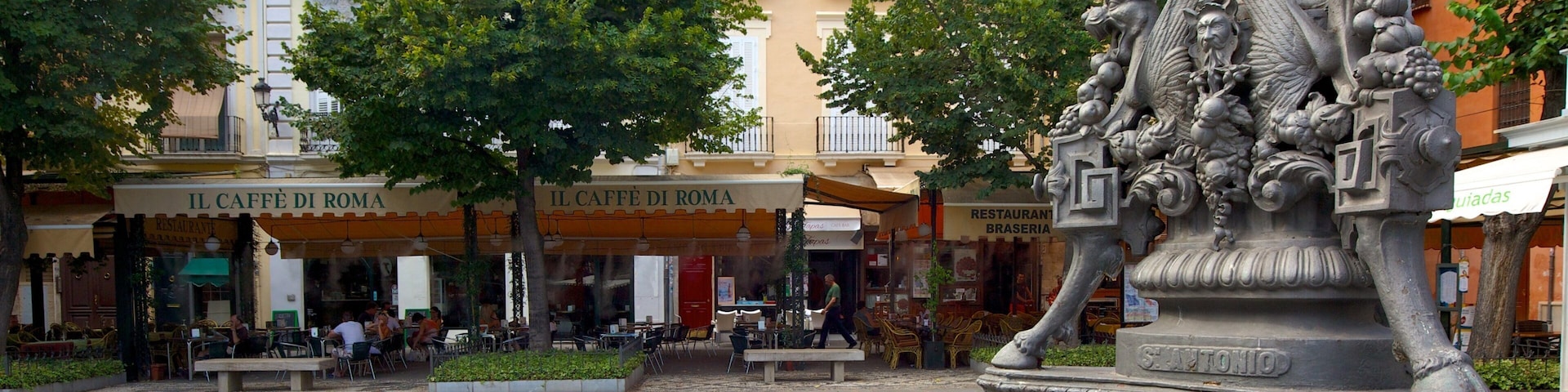 Praça Bib-Rambla mostrando cenas de cafeteria, uma estátua ou escultura e cenas de rua