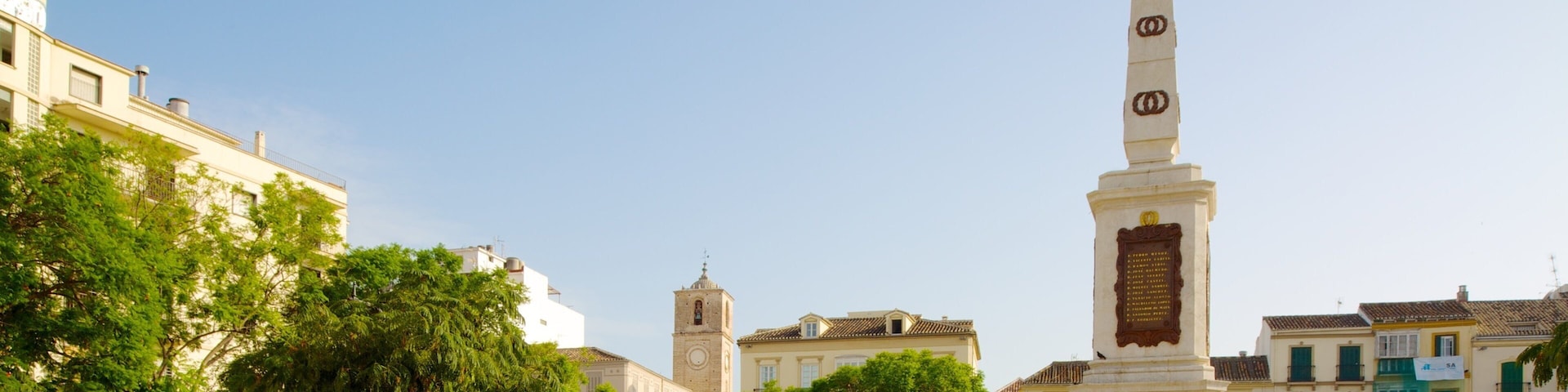 Plaza de la Merced featuring a city, heritage architecture and outdoor art