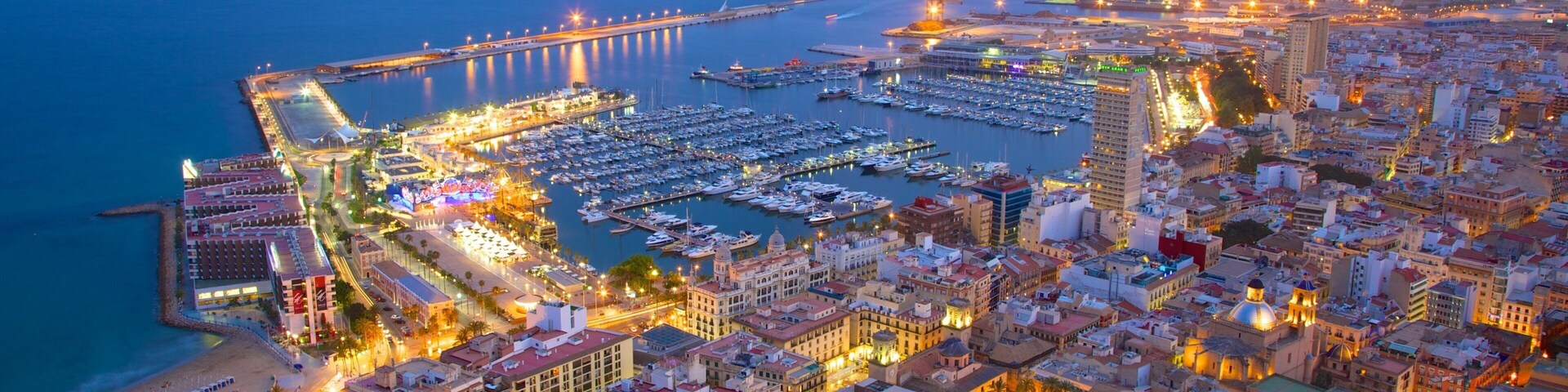 Castle of Santa Barbara featuring a city, night scenes and general coastal views
