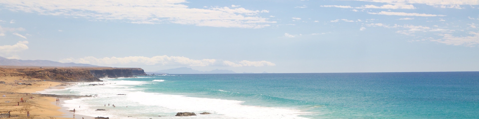 Cotillo Beach which includes general coastal views, rugged coastline and waves